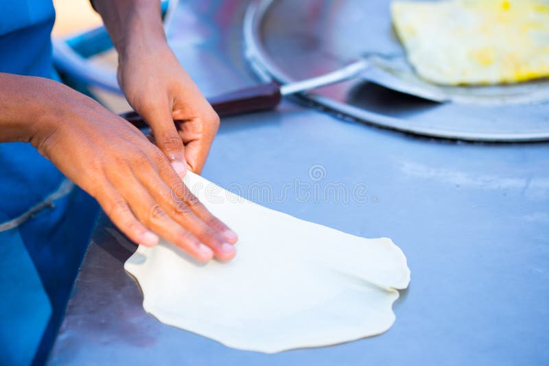 Roti frying in the pan stock photo. Image of traditional - 251685822