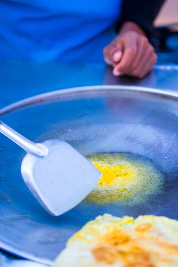 Roti frying in the pan stock photo. Image of traditional - 251685822