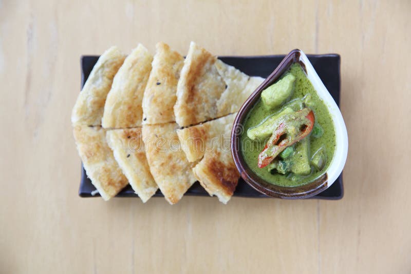 Roti with Green Curry on a Plate Stock Image - Image of curry, canai ...