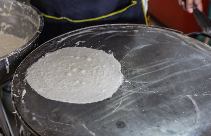 Roti Making, Roti Thresh Flour by Roti Maker with Oil. Indian ...