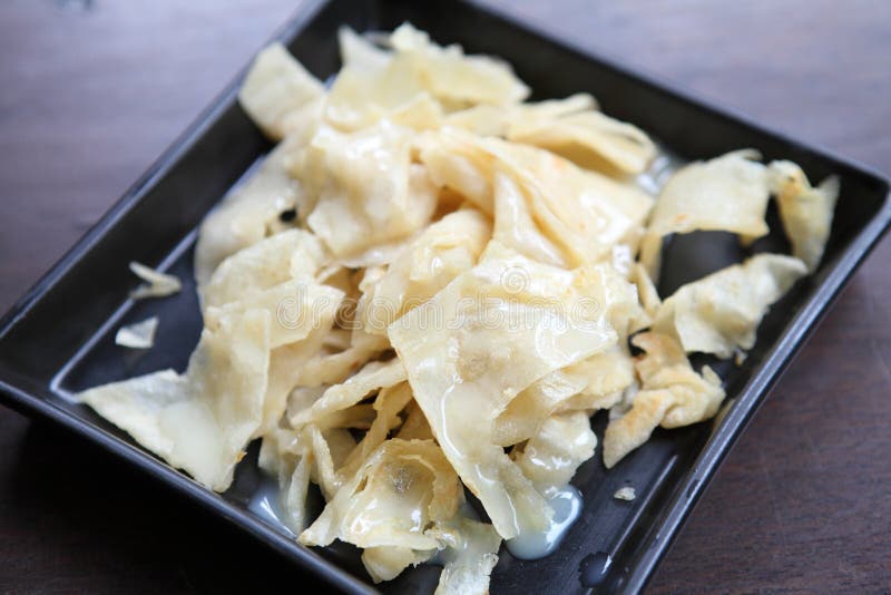 Roti with milk on a plate stock photo. Image of food - 141548468