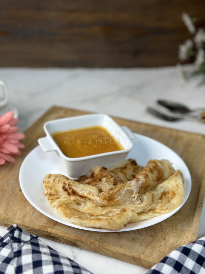 Roti Parata or Roti Canai with Curry Sauce, a Popular Malaysian ...