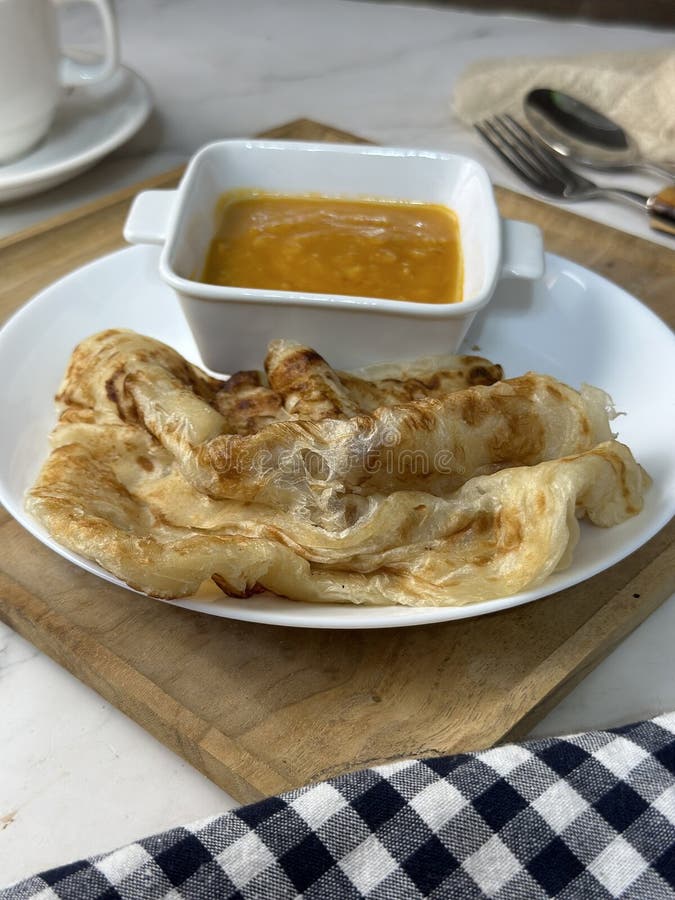 Roti Parata or Roti Canai with Curry Sauce, a Popular Malaysian ...