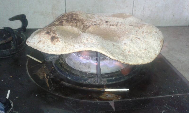 Roti in stove stock photo. Image of stove, high, roti - 239071350
