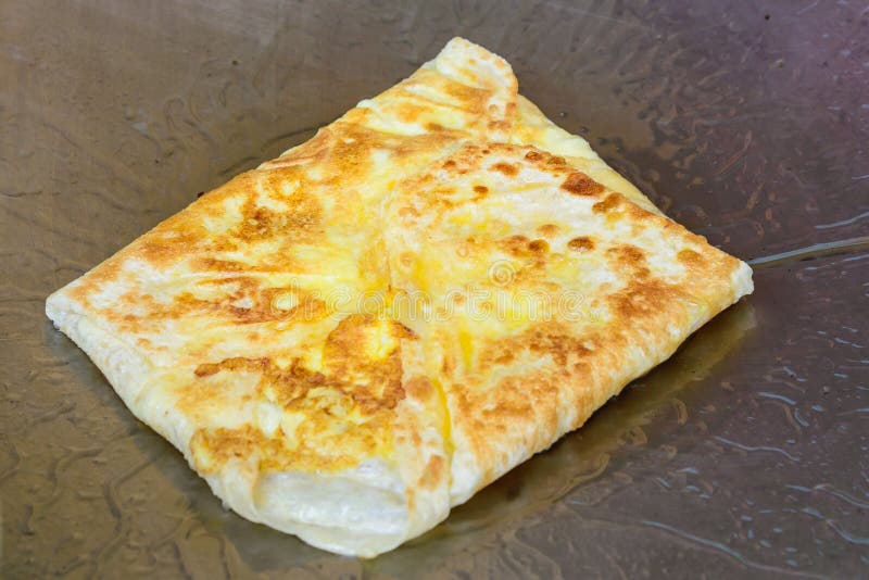 Roti , Thai Dessert Pancake with Milk and Eggs Stock Photo - Image of ...