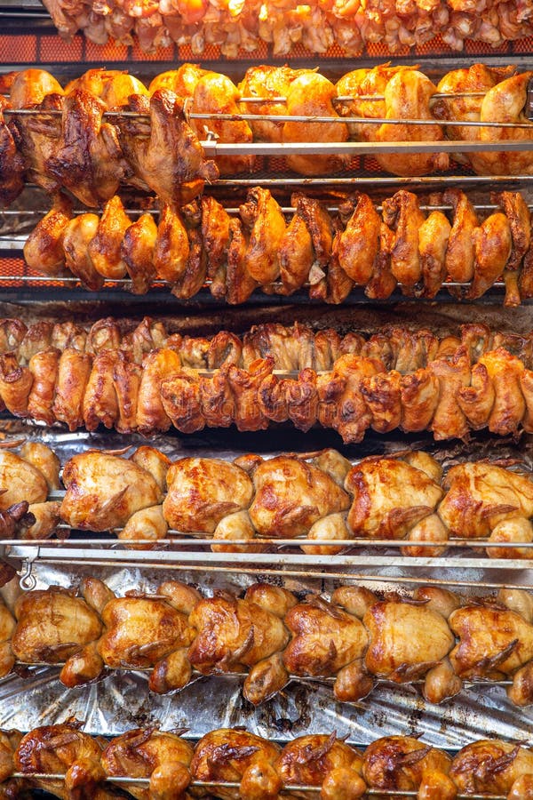 Rotisserie Chicken on a Rack Stock Photo - Image of heated, vendor ...