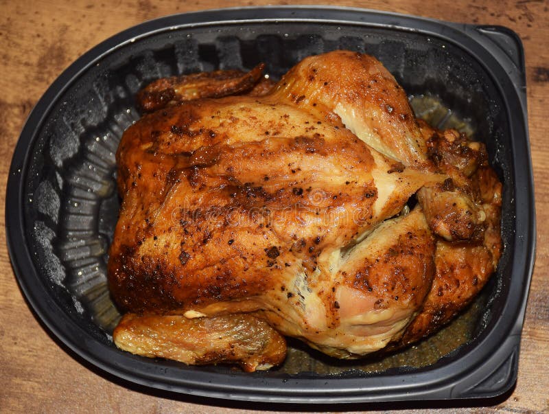 Rotisserie Chicken Served on a Plastic Plate Stock Photo - Image of ...