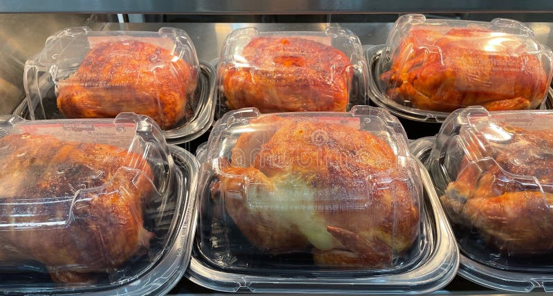 Rotisserie Cooked Whole Chicken in Plastic Containers Stock Photo ...