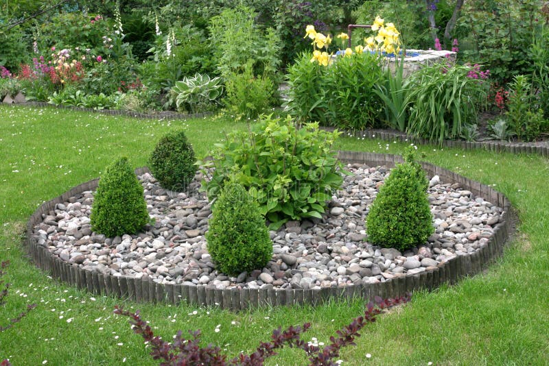 Rotstuin stock afbeelding. Image of groen, bloemen, lente - 5340603