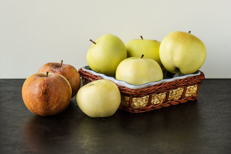 Rotten Apples on a Table with Ripe Apples Stock Photo - Image of green ...