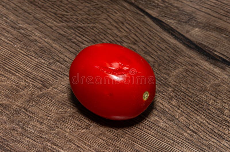 Rotten Spoiled Tomato on the Table Stock Photo - Image of dessert ...