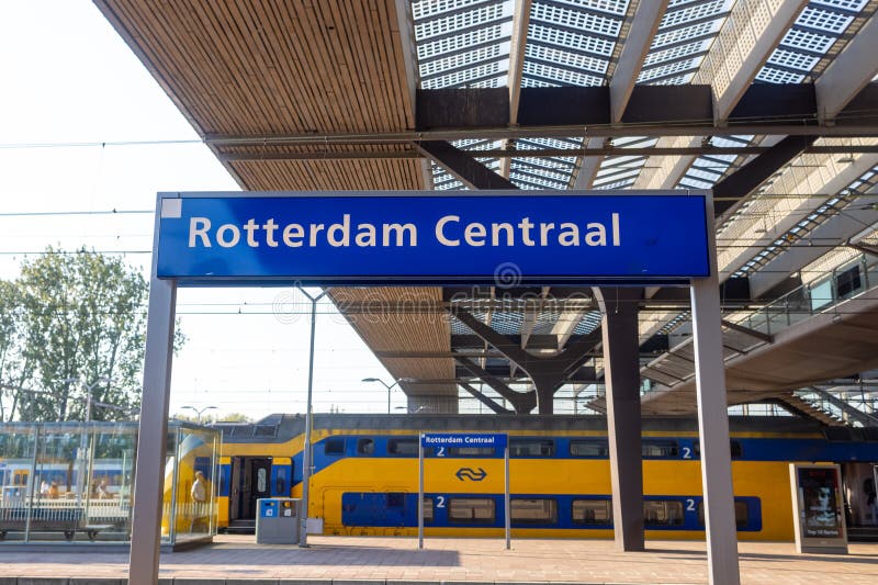 Rotterdam Centraal Sign and Train at the Platform, Rotterdam Centraal ...