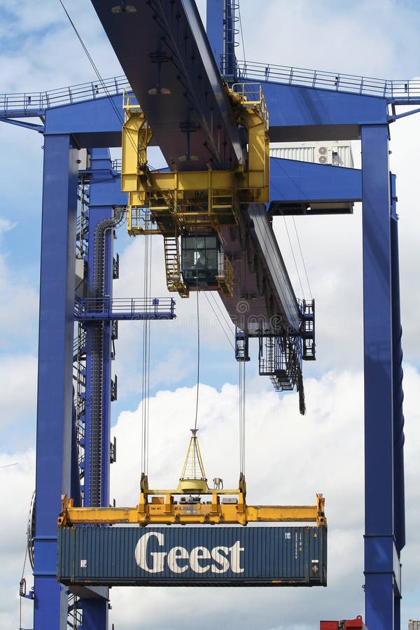 Crane loading or unloading editorial photo. Image of rotterdam - 107372911