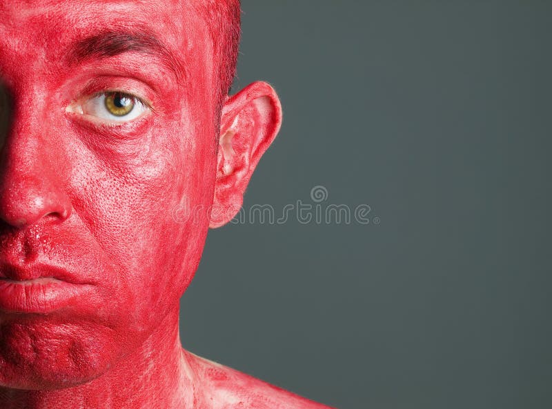 Rouge 2 De Renivellement D'homme De Visage Image stock - Image du ...
