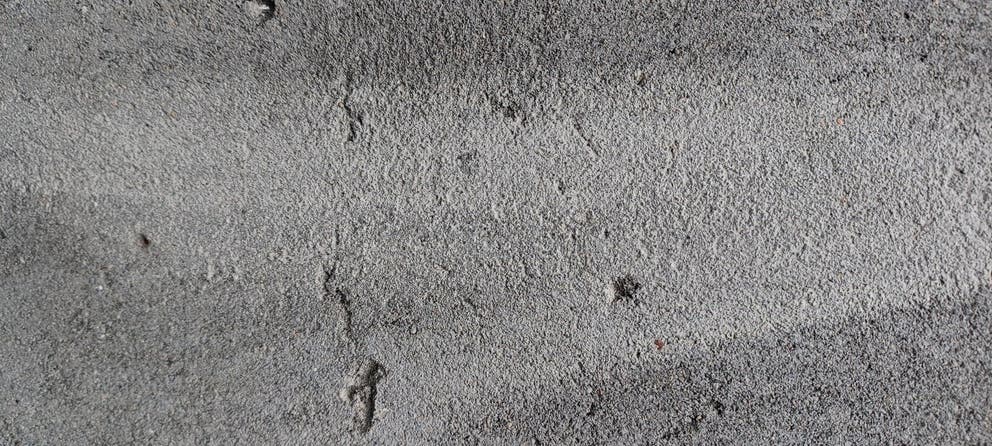 A Close-up of Rough Cement or Concrete Texture, Showing Its Natural ...