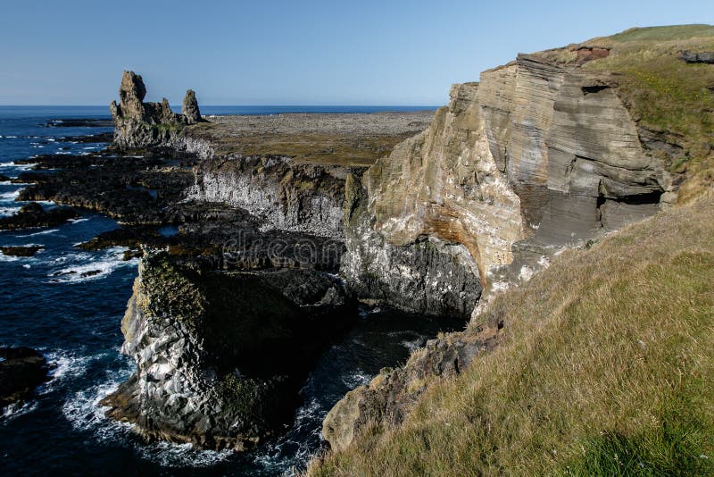 Rough cliffs stock image. Image of waves, drop, nordic - 99329409