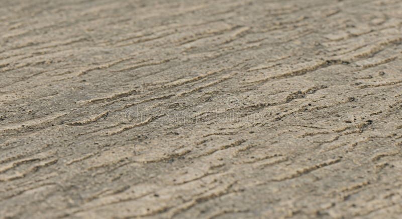 Rough Concrete Surface Displaying Irregular Horizontal Grooves in a ...