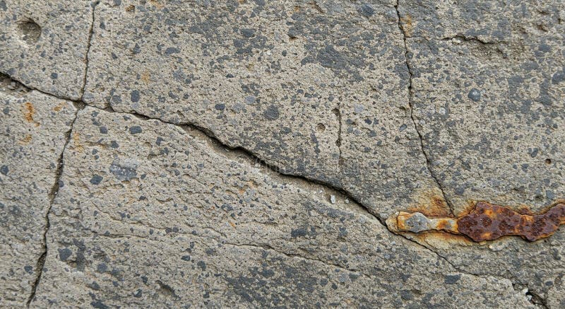 Rough Concrete Surface with Visible Cracks and Textural Irregularities ...
