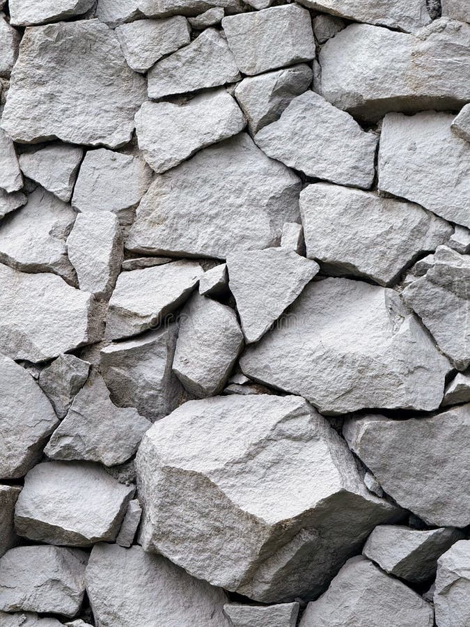 Rough-Cut Stone Wall with Natural Texture and Irregular Geometry Stock ...