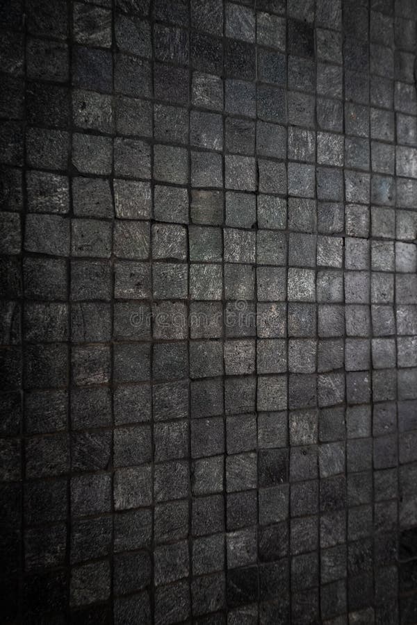 Dark Grey Mosaic Tiles on the Wall that Reflect Light Uniquely Stock ...