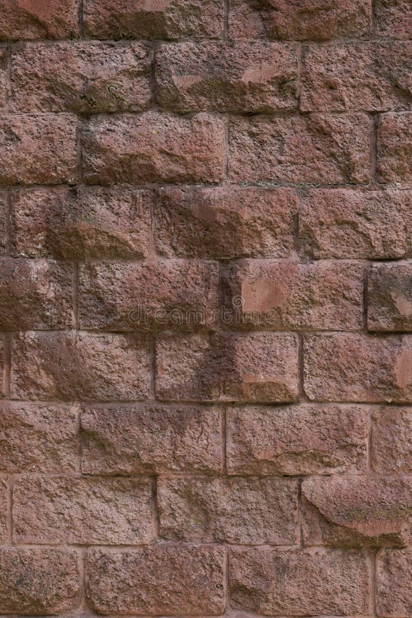 Ragged Decorative Tile of Maroon Color on Wall in the Yard Stock Image ...