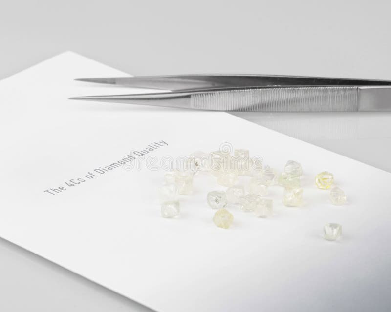 Rough Diamonds and the 4 C`s of Diamond Grading Stock Photo - Image of ...