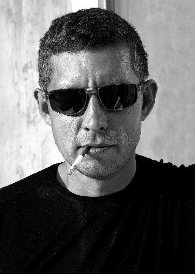 The Rough Macho with a Cigarette Stock Photo - Image of hooligan ...