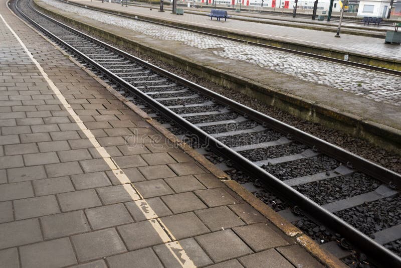 Rough Rail Tracks stock photo. Image of diagonal, industrial - 52640370