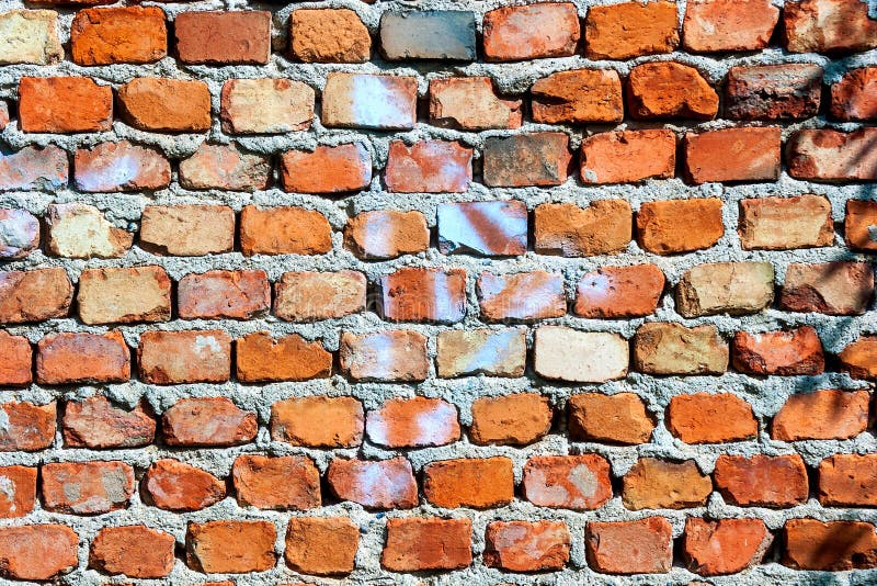 Rough red brick wall stock image. Image of construction - 79151667
