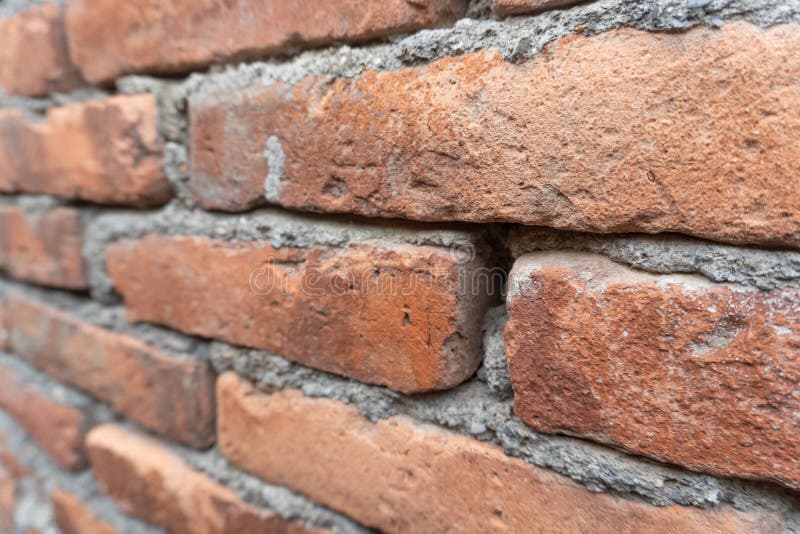 Rough red brick wall 5 stock photo. Image of asphalt - 207744398