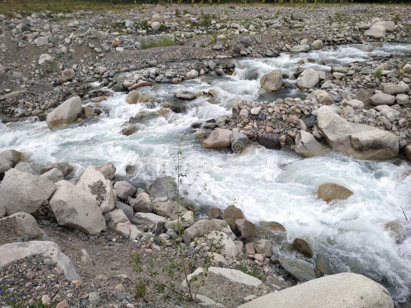 Rough river among stones stock image. Image of water - 188547215