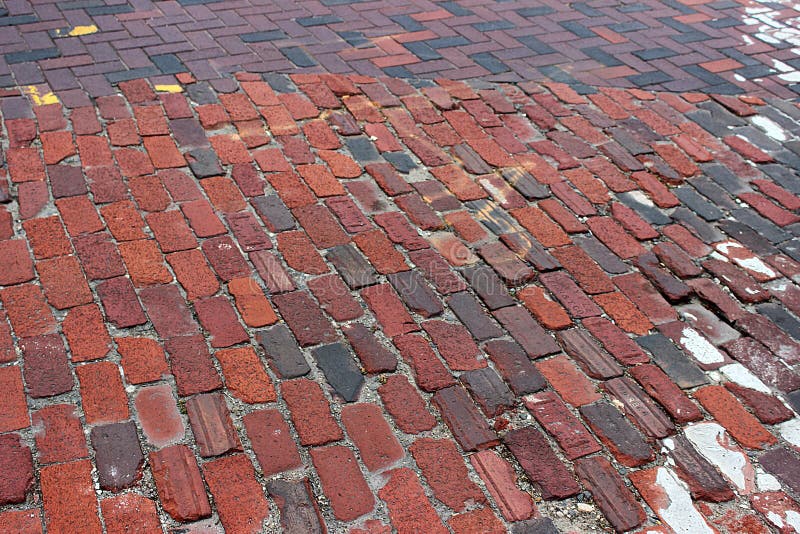 A Rough Road Made of Stones on the Border with Asphalt. Stock Photo ...