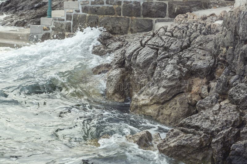Rough sea and the rocks stock image. Image of rocks - 183829073