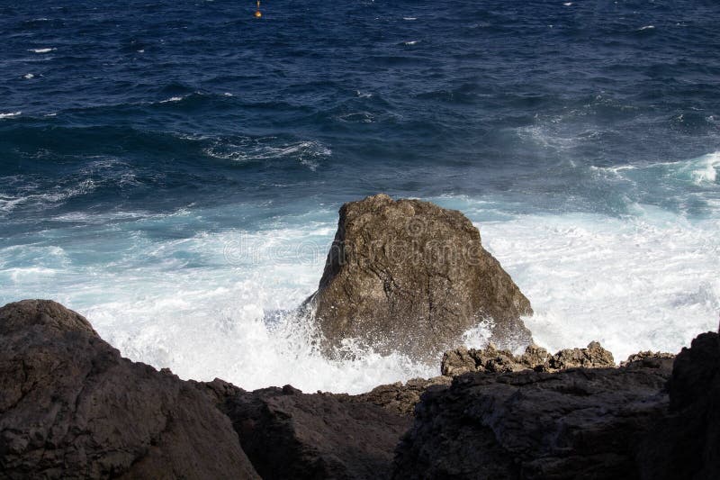 Rough Sea Slamming Against the Rocks Stock Photo - Image of water, fish ...