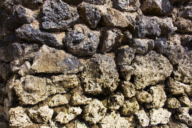 Rough Stone Solid Wall Closeup Photo. Stone Wall Texture. Rustic Stone ...