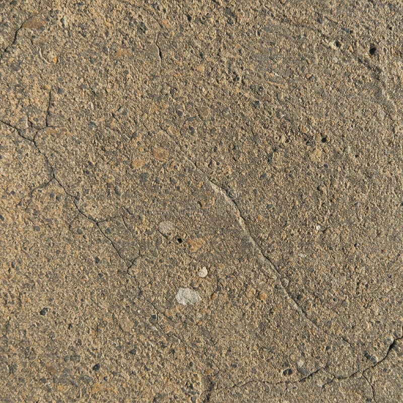Rough Stone Surface with Varied Texture Featuring Small Pebbles and ...