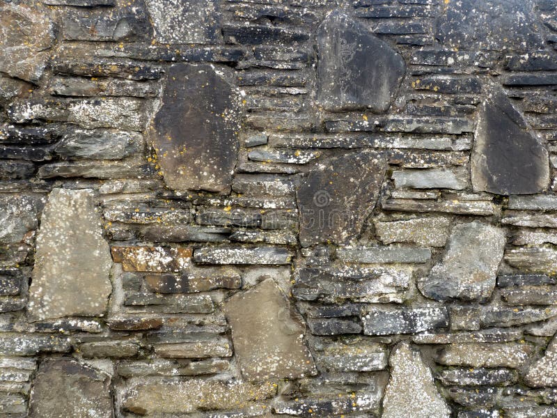 Rough Stone Wall Texture Background. Old and Weathered Surface Stock ...