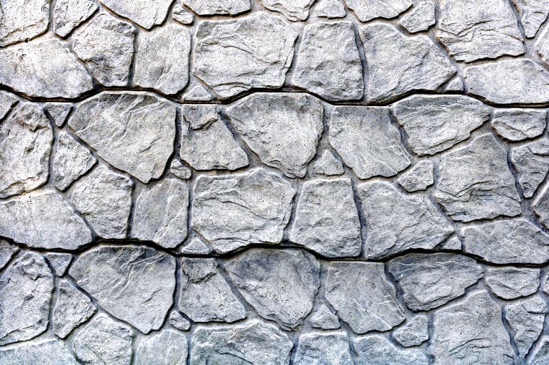 Rough Stone Wall Texture. a Close-up View of a Rough Stone Wall with ...
