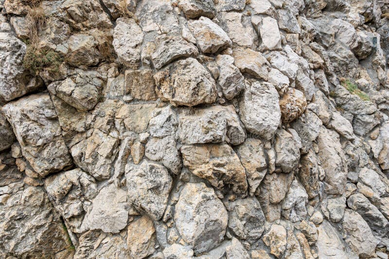 Rough Stone Wall Texture with Natural Rock Patterns and Earthy Tones ...