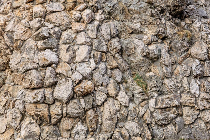Rough Stone Wall Texture with Natural Rocks and Cracks Stock Photo ...