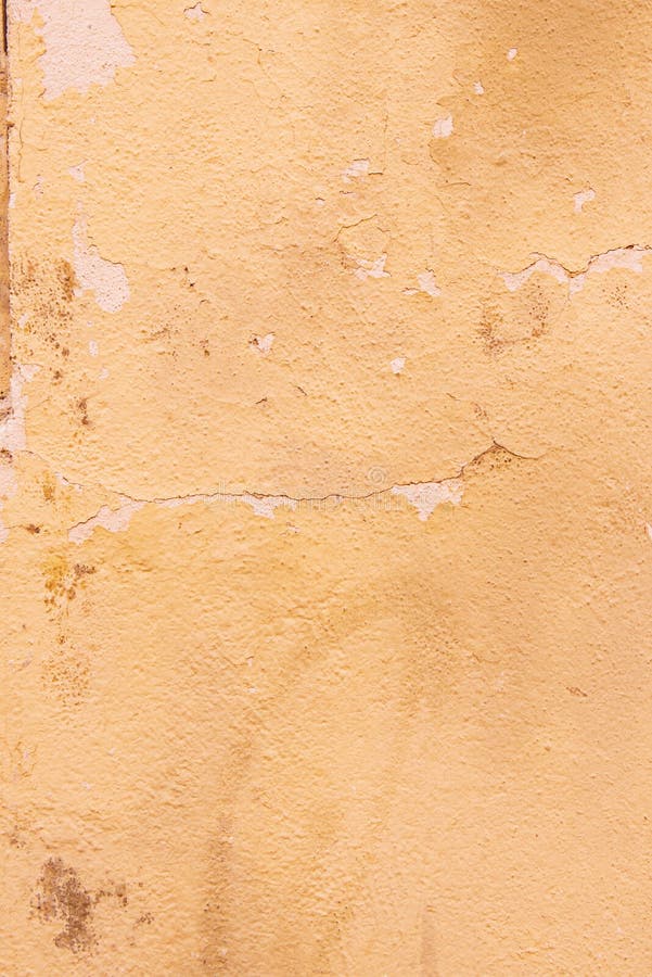 Rough Surface of a Wall with Peeling Paint of Pale Cream Yellow Color ...