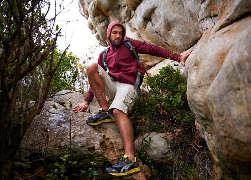 Rough Terrain for a Tough Man. a Young Man Enjoying a Hike through the ...