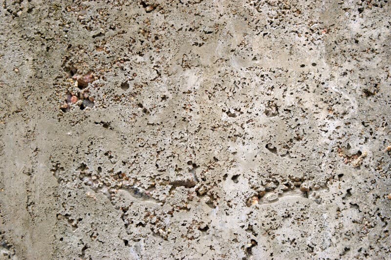 A Rough Textured Cement Wall Surface with Dark Stains Present Wall ...