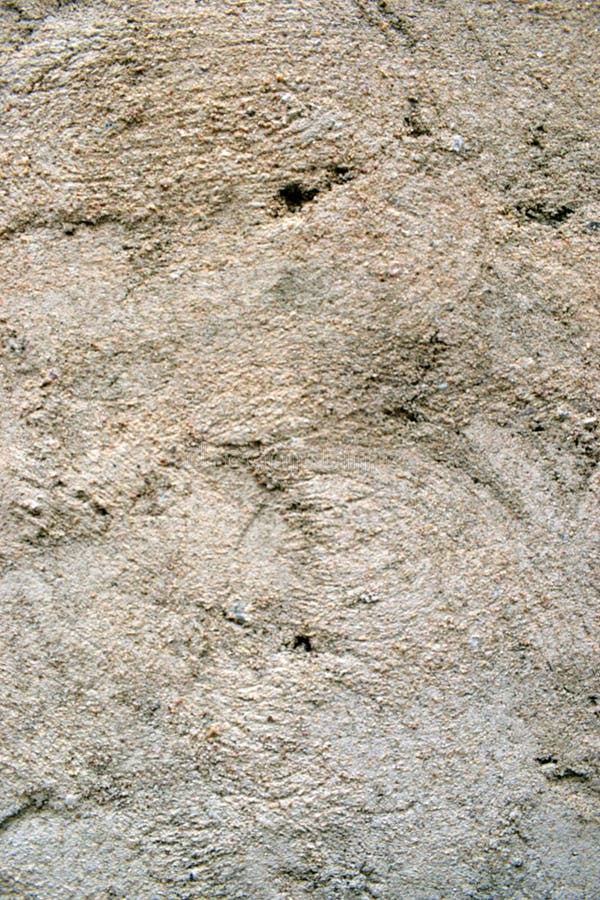 A Rough Textured Cement Wall Surface with Dark Stains Present Wall ...