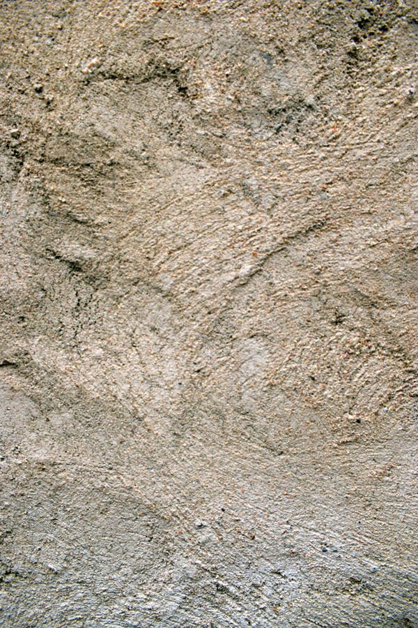 A Rough Textured Cement Wall Surface with Dark Stains Present Wall ...