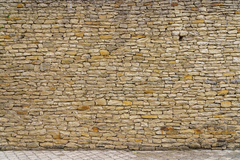 Rough Textured Natural Stone Wall Surface. Background or Backdrop Stock ...