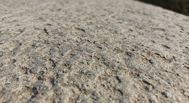 Rough, Textured Surface of a Stone or Concrete Material Displayed in ...