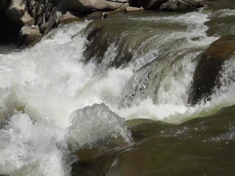 Rough Water Flows through the Stones. Waterfall. Stock Footage - Video ...