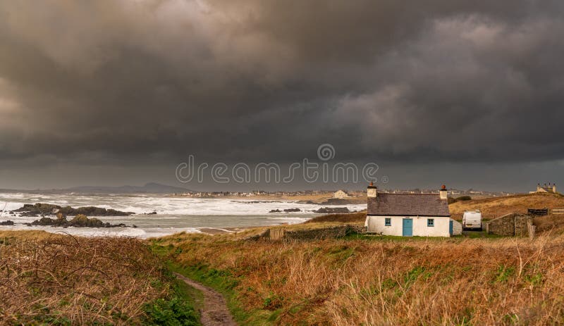 Looking Back at Rhosneigr with Rough Seas Stock Photo - Image of storm ...