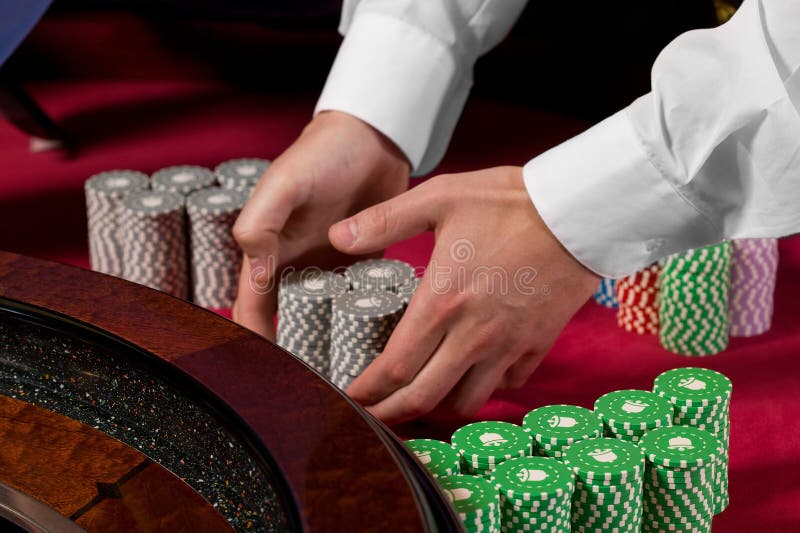 Roulette and chips stock photo. Image of closeup, hands - 13343372